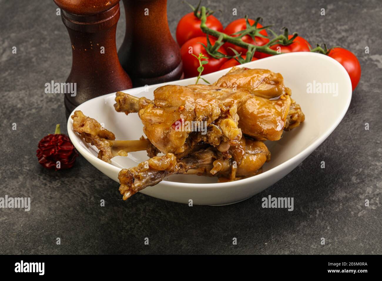Rabbit stew in sweet and spicy sauce Stock Photo - Alamy