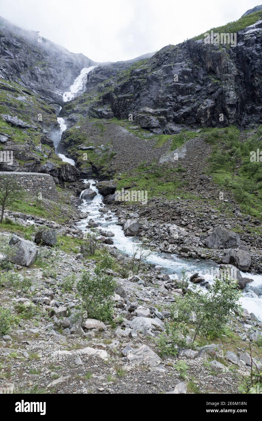 Trollstigen mountain pass with Stigfossen waterfall in Norway; view ...