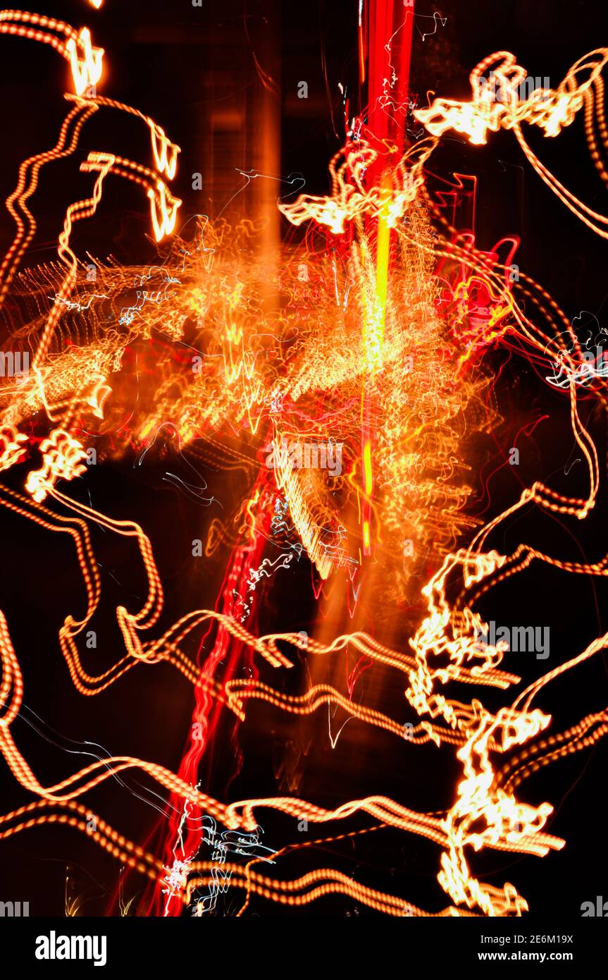 High-speed radial light paths of city lights and car headlights on the ...