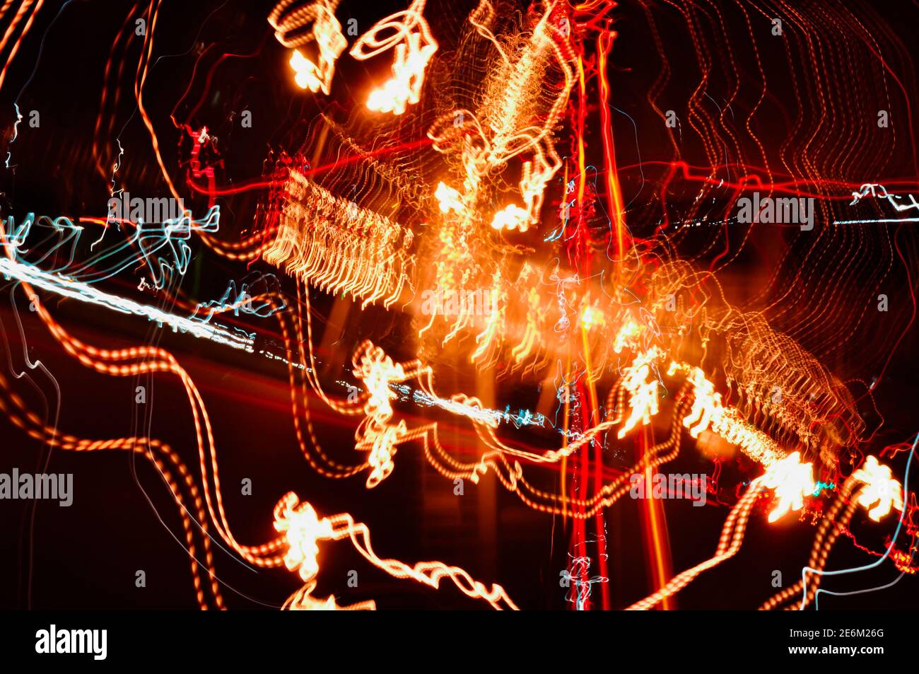 High-speed radial light paths of city lights and car headlights on the ...