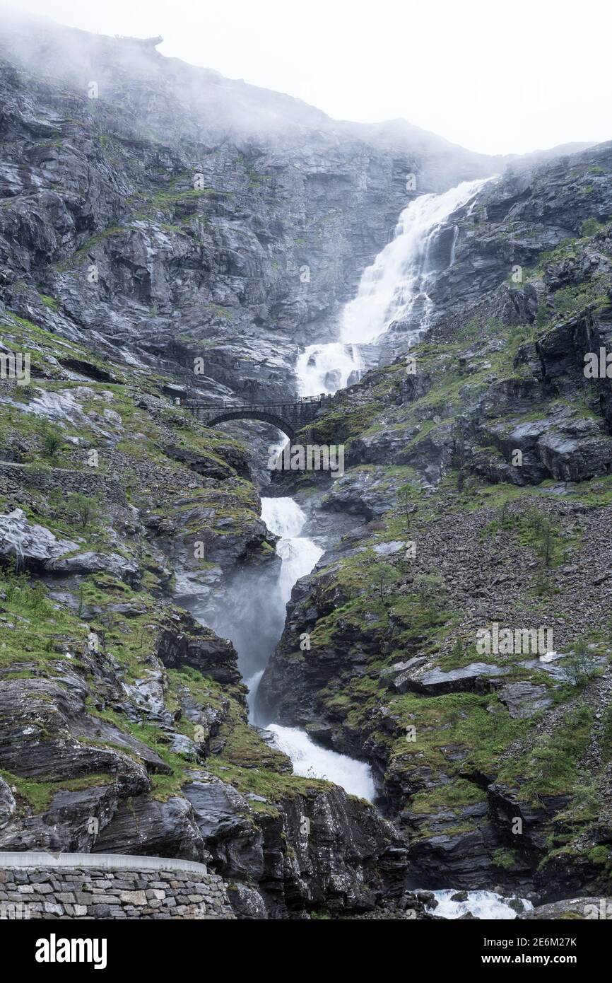 Trollstigen mountain pass with Stigfossen waterfall in Norway; view ...