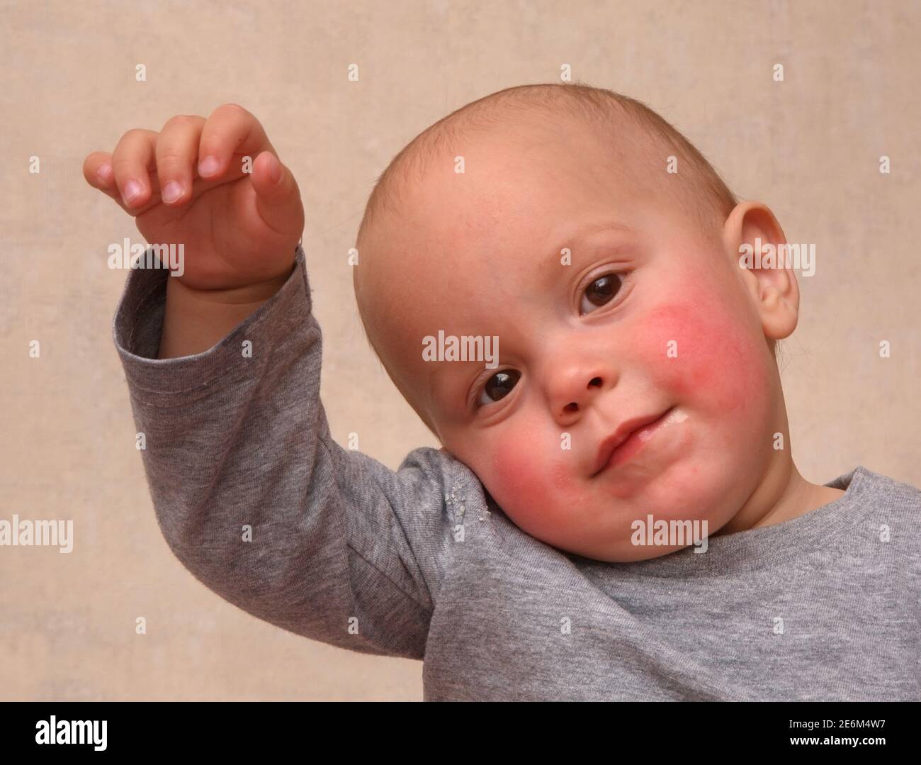 Small boy with pink cheeks Stock Photo - Alamy