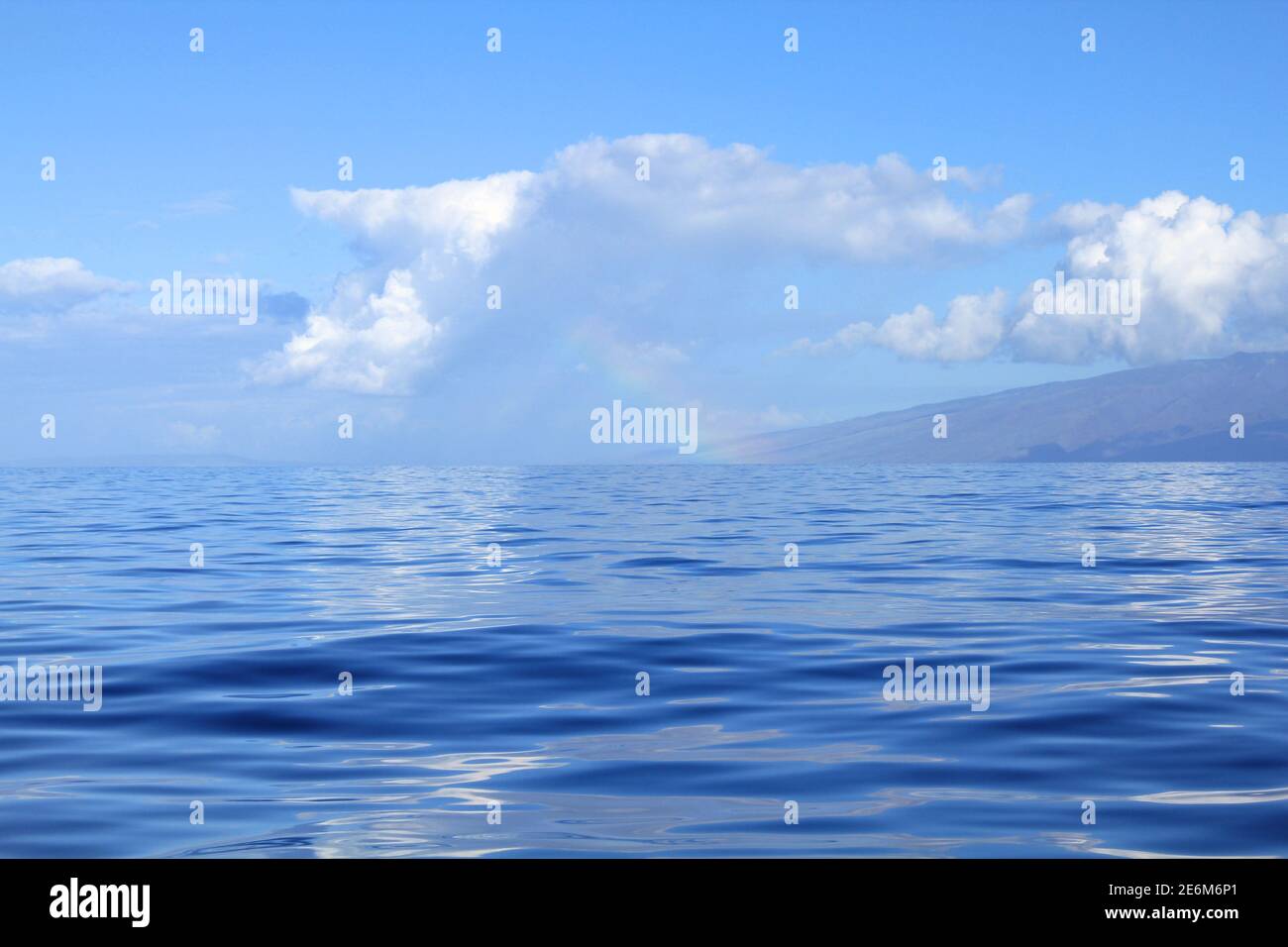 Morning rainbow over Pacific Ocean by Lahaina island, Hawaii Stock ...