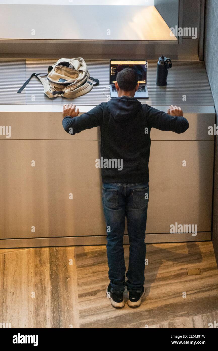 office worker checking laptop at Hudson Yards Manhattan NYC Stock Photo ...