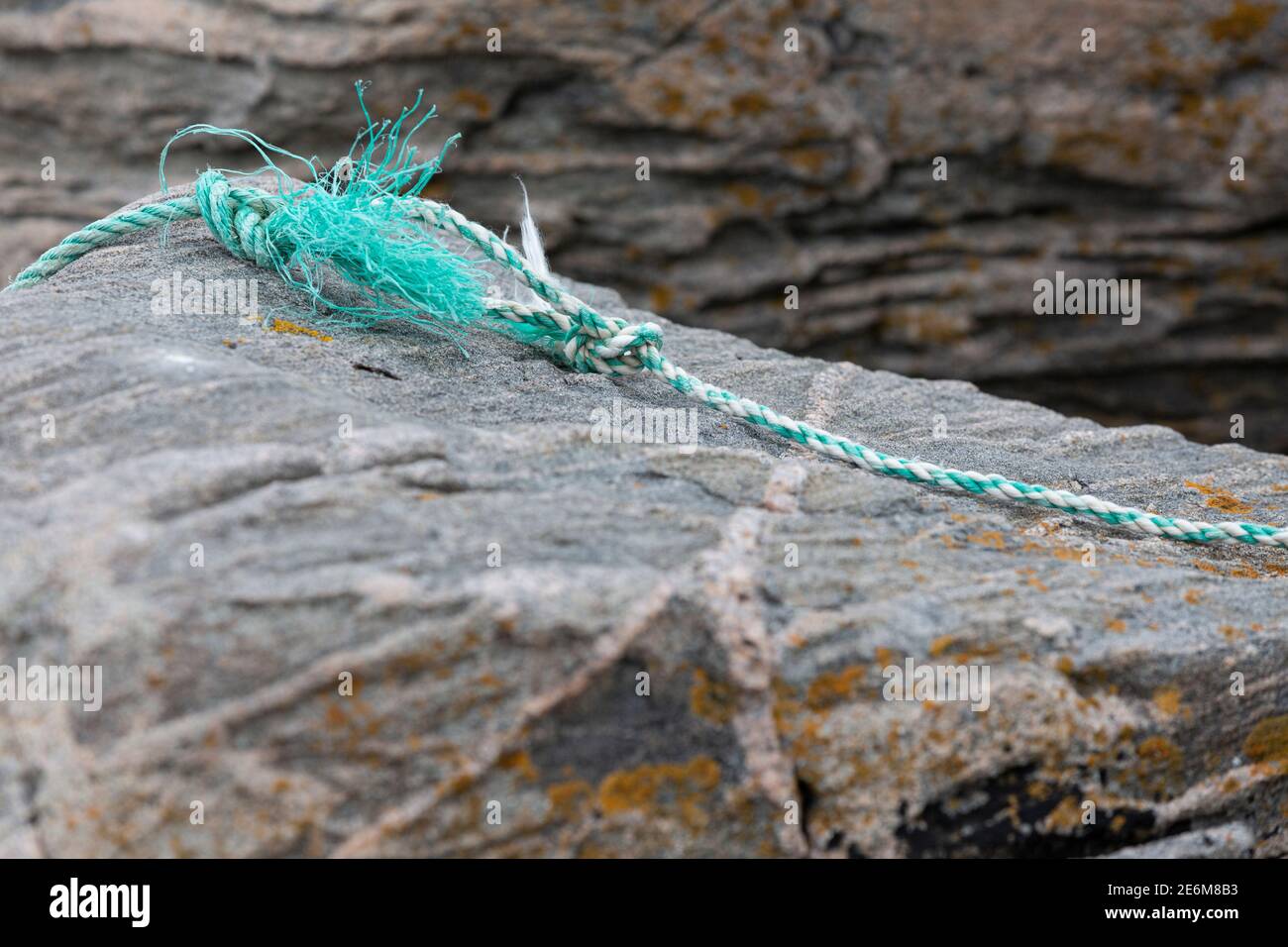 Washed up ragged rope on a cliff near Lindesnes, Norway Stock Photo - Alamy
