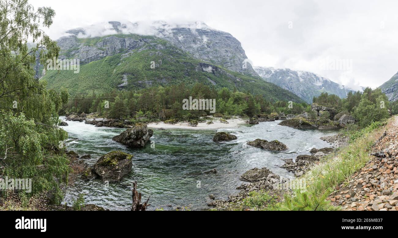 Torrential stream Rauma flowing through the high valley Romsdal in ...