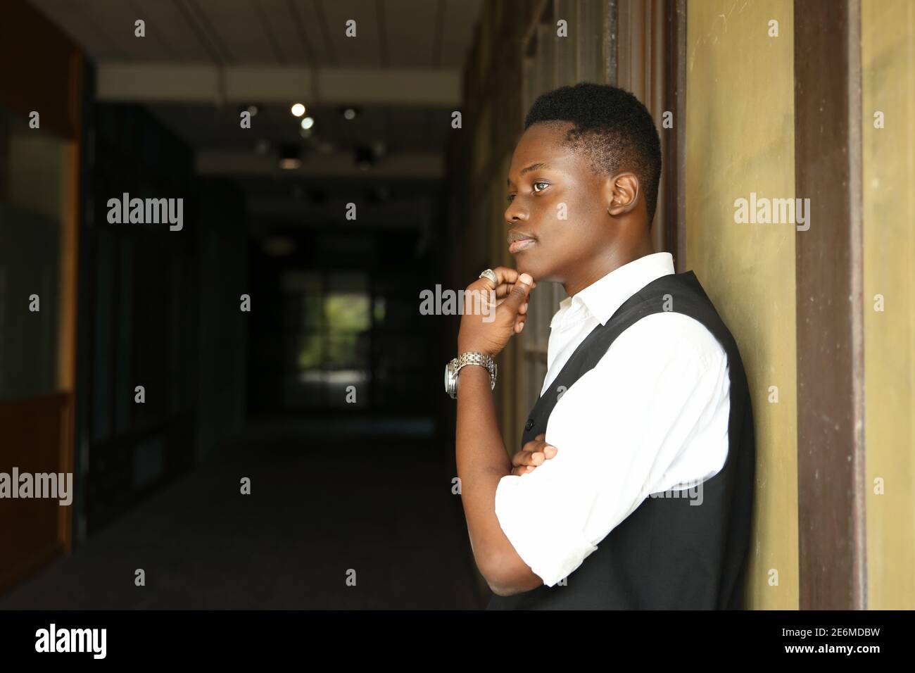 Portrait of young handsome afro black man posing outdoor Stock Photo - Alamy