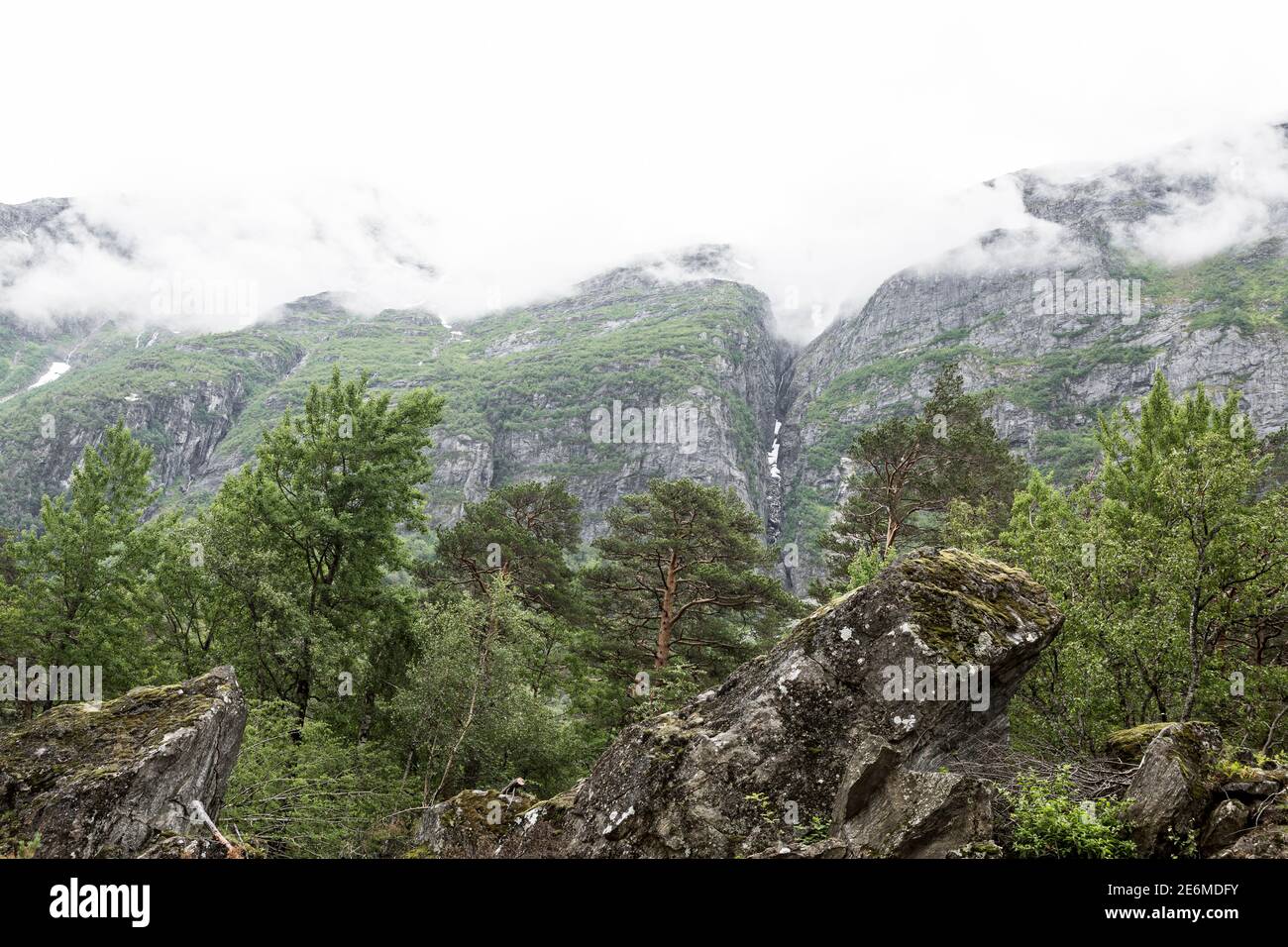 Hiking at the foot of the mountains of Andalsnes, Norway Stock Photo ...