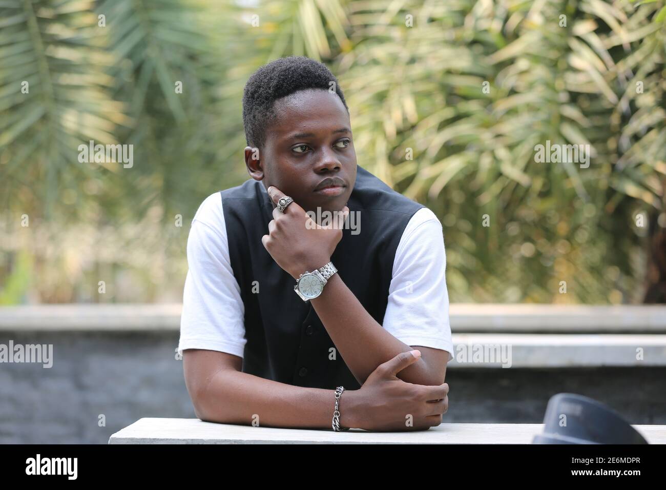 Portrait of young handsome afro black man posing outdoor Stock Photo ...