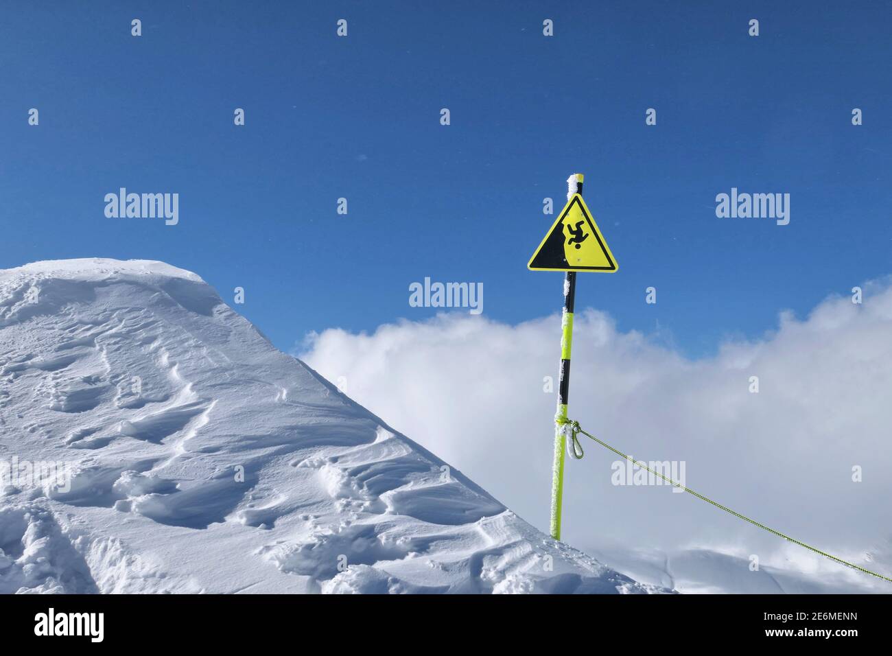 Fall warning sign from the mountain in winter. Alpine landscape Stock ...