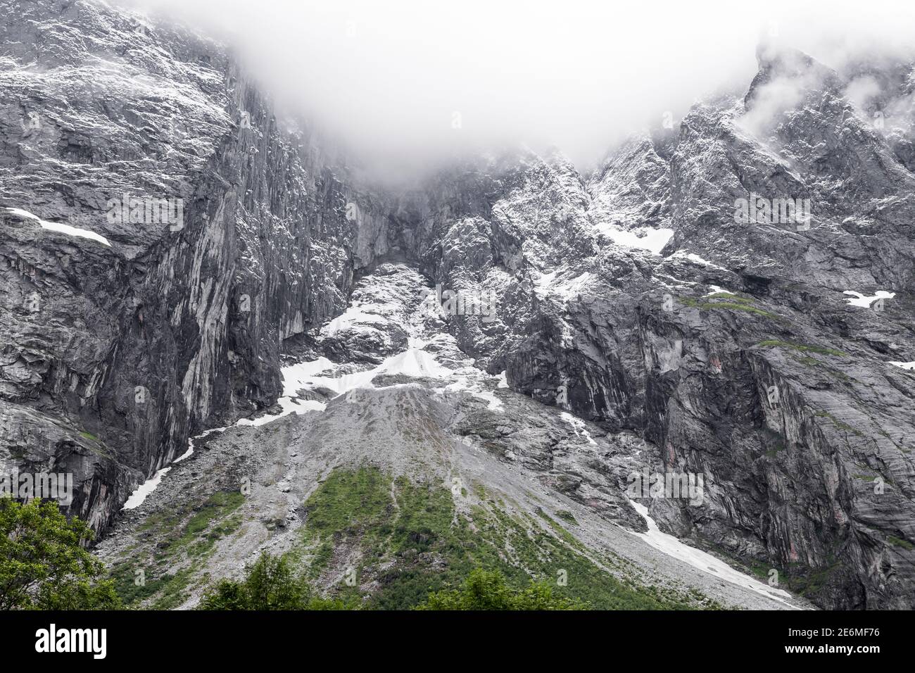Hiking at the foot of the mountains of Andalsnes, Norway Stock Photo ...