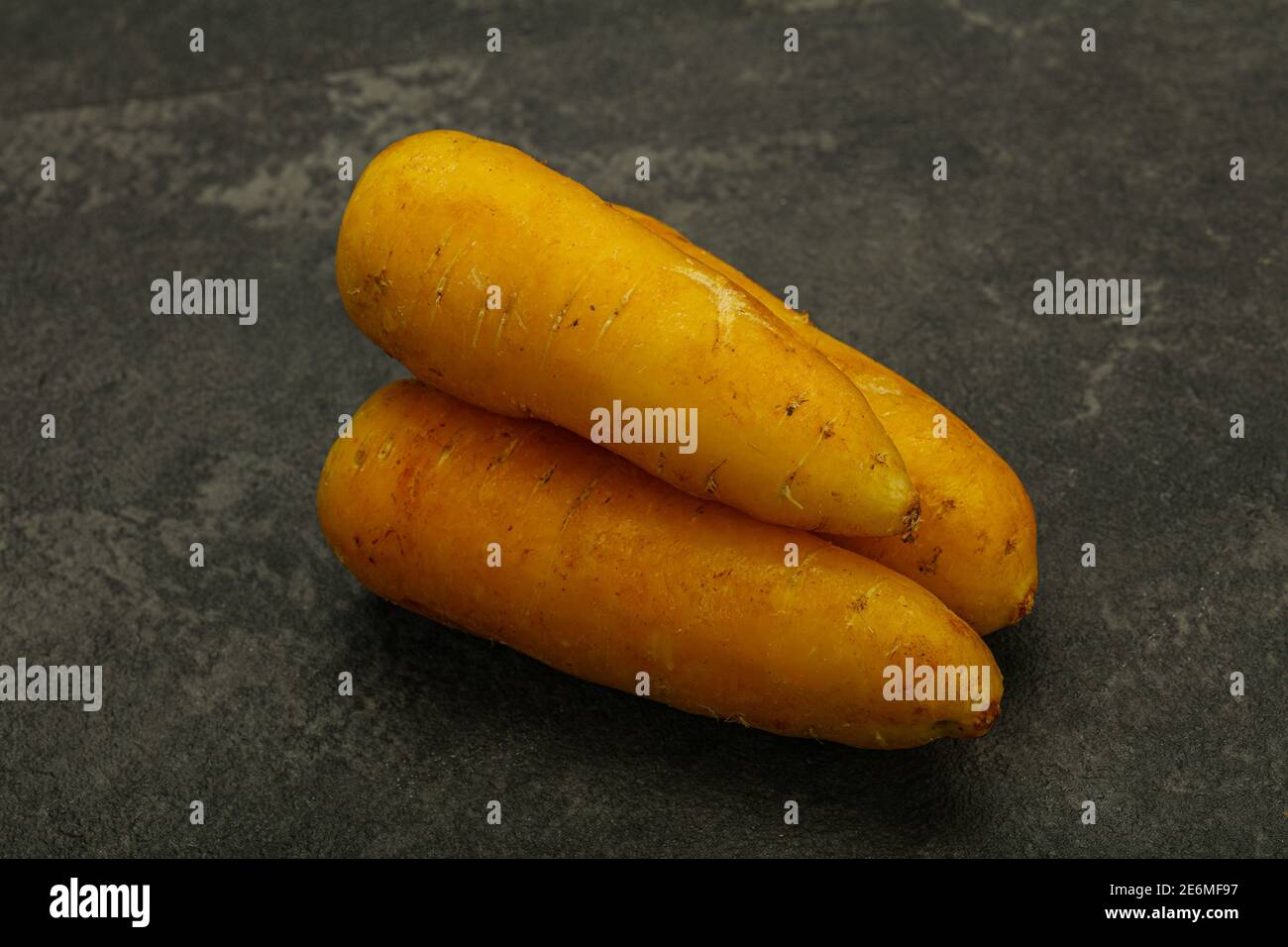 Natural vegan food - Raw Yellow carrot Stock Photo - Alamy
