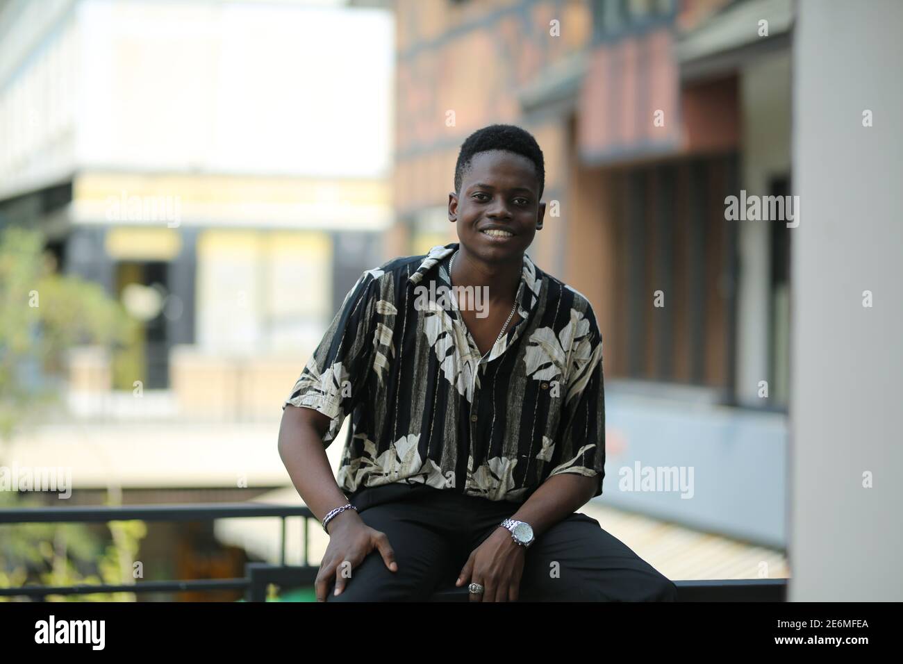 Portrait of young handsome afro black man posing outdoor Stock Photo ...