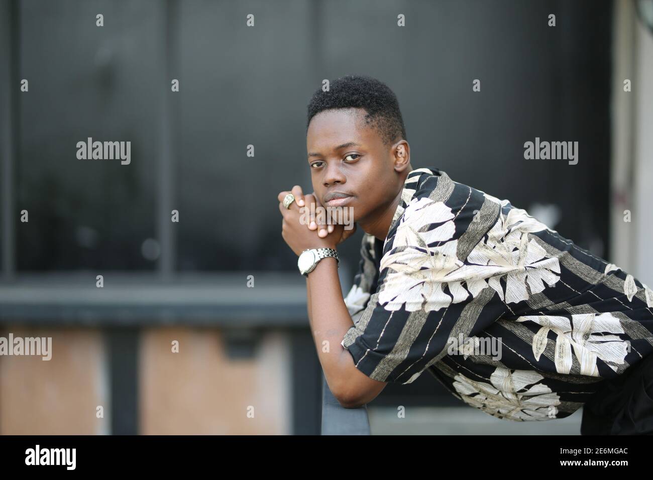 Portrait of young handsome afro black man posing outdoor Stock Photo ...