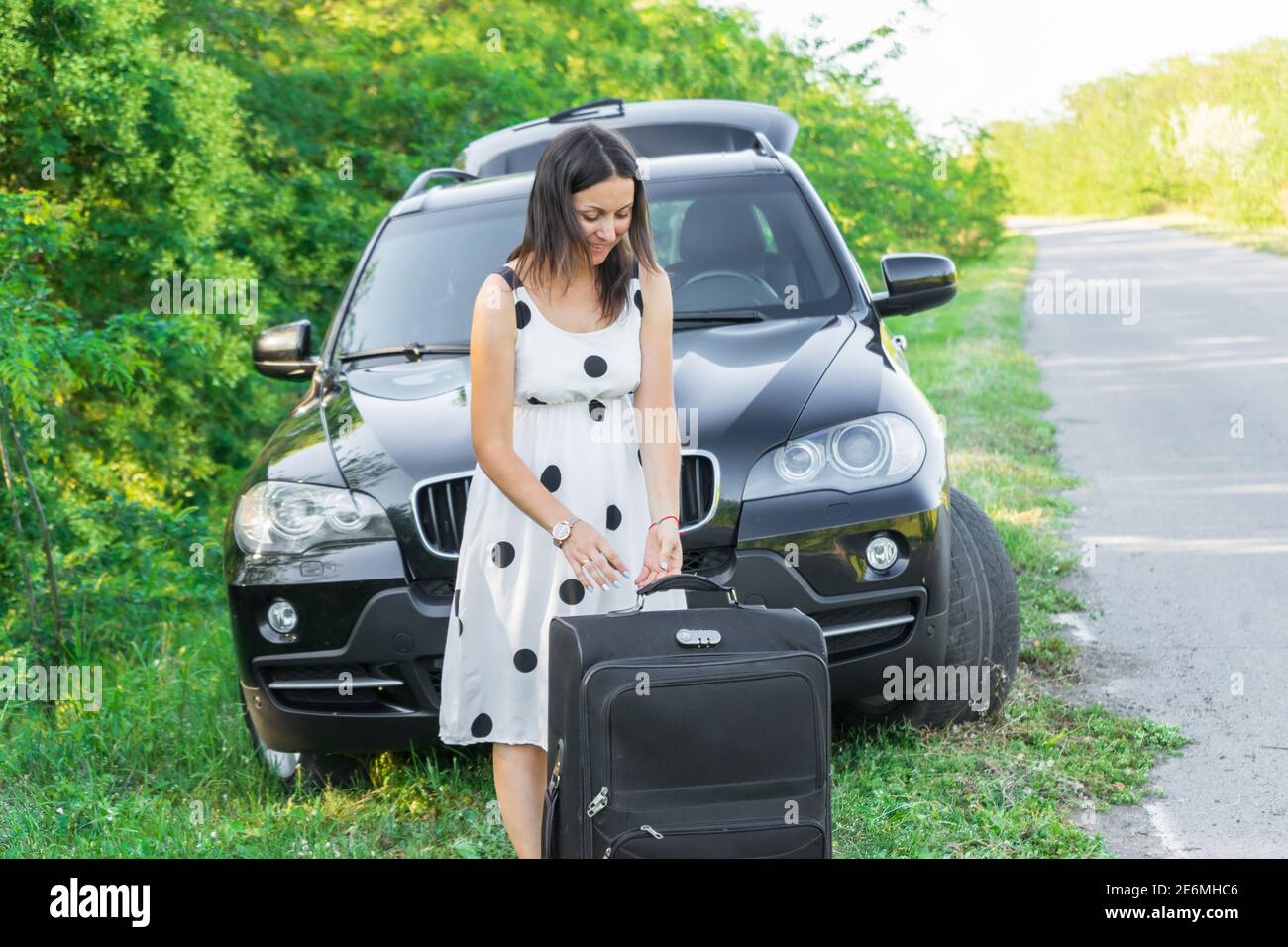 Female exiting car hi-res stock photography and images - Alamy