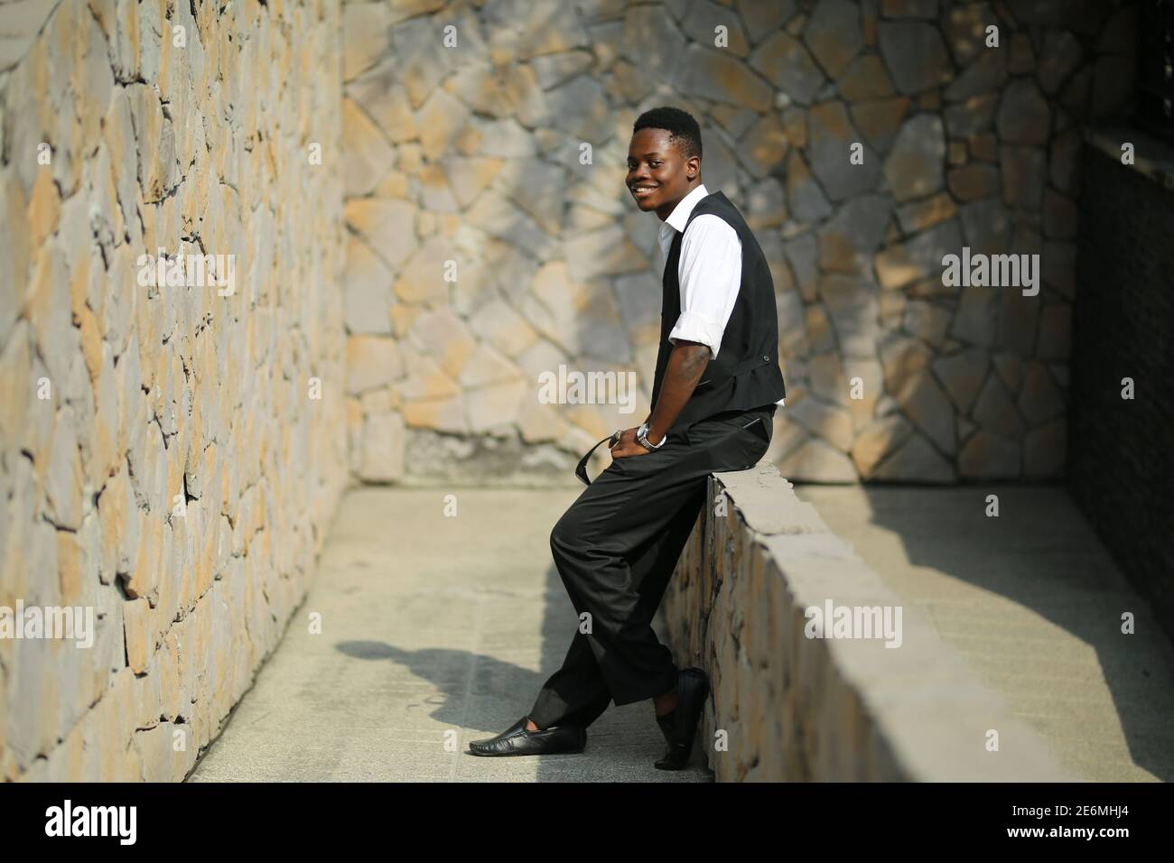 Portrait of young handsome afro black man posing outdoor Stock Photo ...
