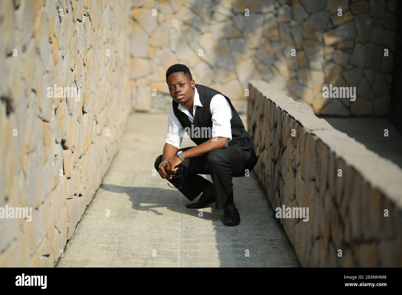 Portrait of young handsome afro black man posing outdoor Stock Photo ...