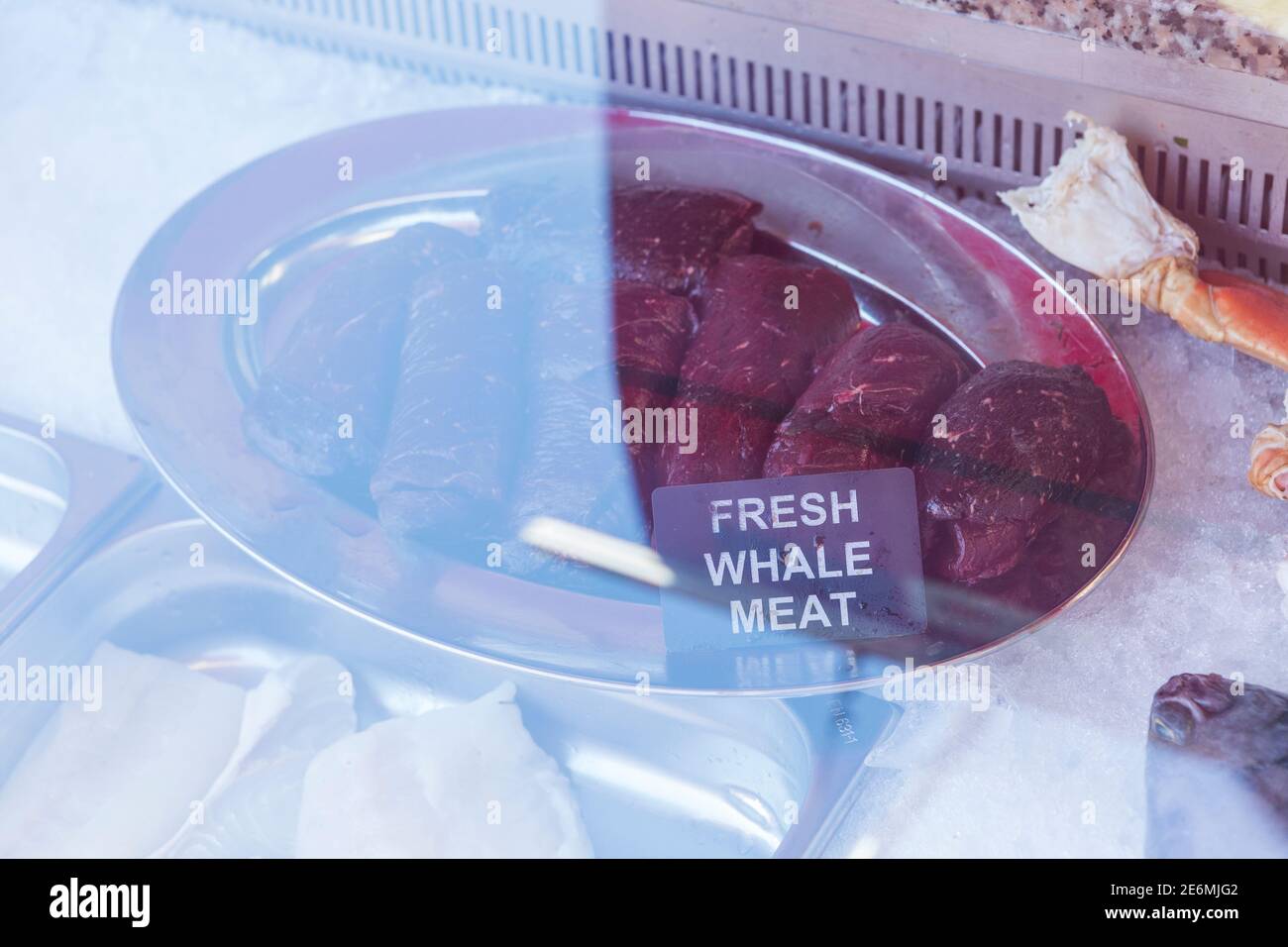 Fresh whale meat on a silver plate at the market in Bergen, Norway ...