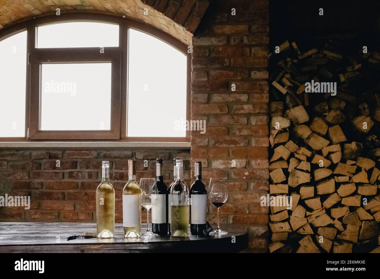 Red and white wine bottles table hi-res stock photography and images ...