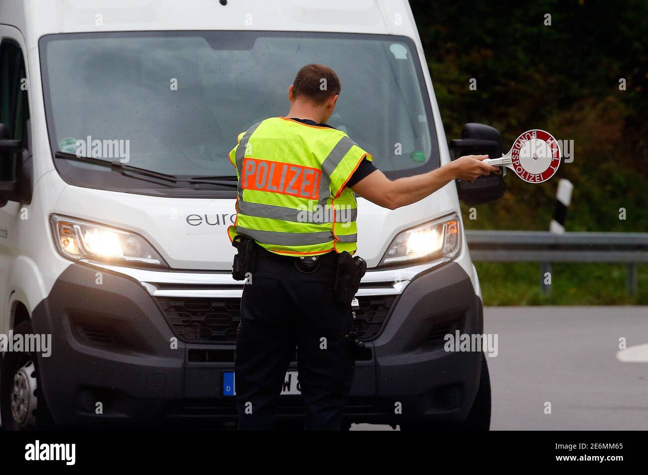 German policeman writing hi-res stock photography and images - Alamy