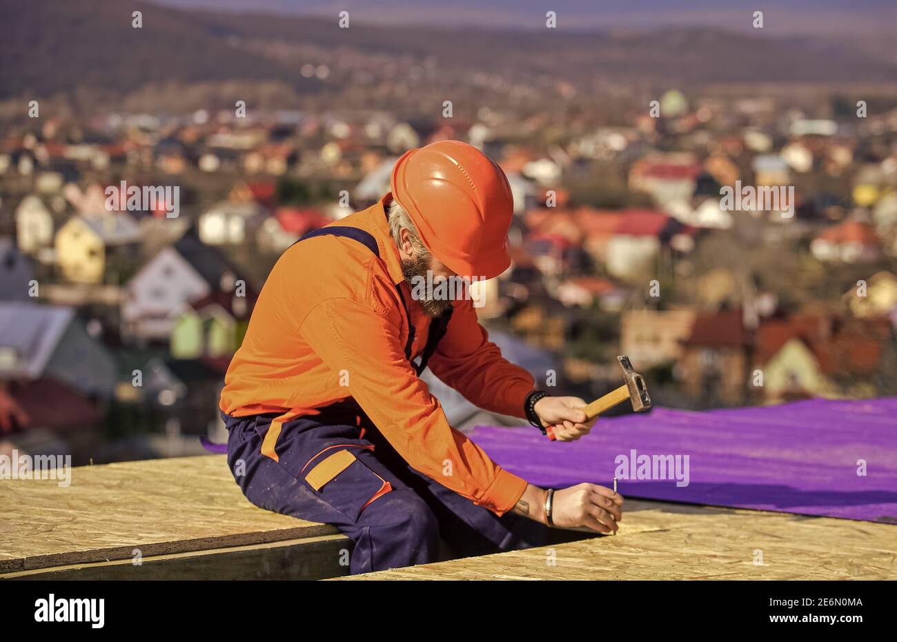 Professional master repair roof. Flat roof installation. Roofer ...