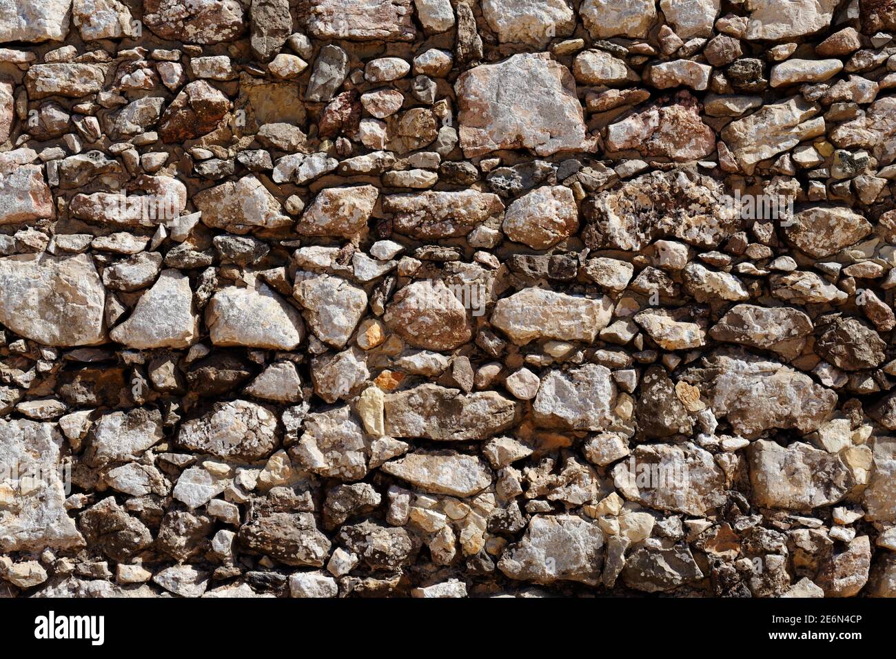 Ancient rough stone wall texture Stock Photo - Alamy