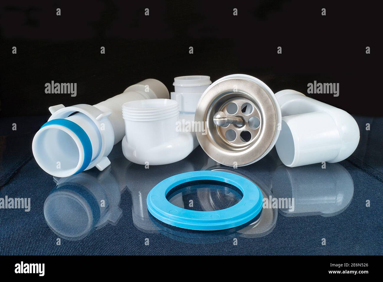 The Plastic siphon for sink on black background.Spare details for ...