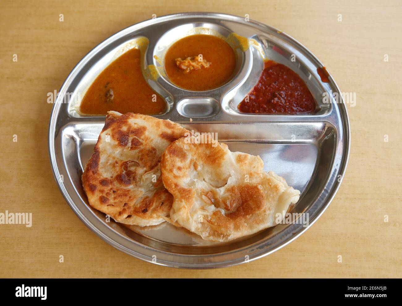 Roti prata s hi-res stock photography and images - Alamy