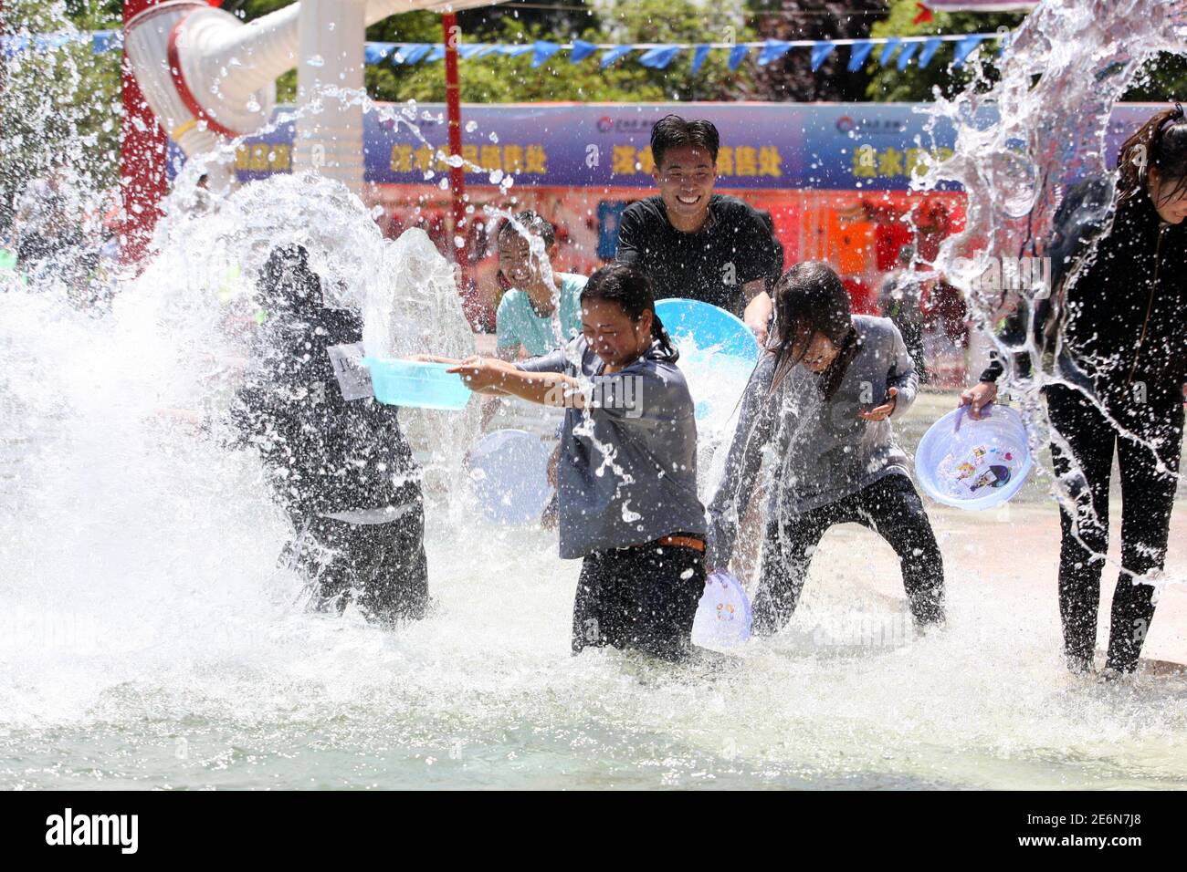 Water sprinkling festival china hi-res stock photography and images - Alamy