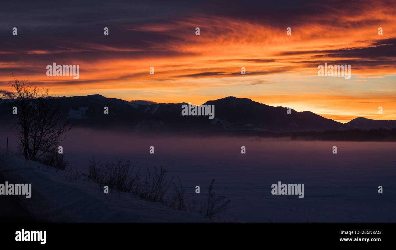 Red misty landscape panorama in mountains. Fantastic dreamy sunrise on ...