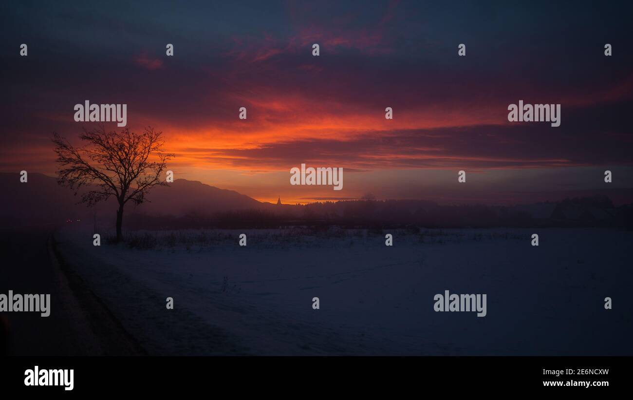 Red misty landscape panorama in mountains. Fantastic dreamy sunrise on ...