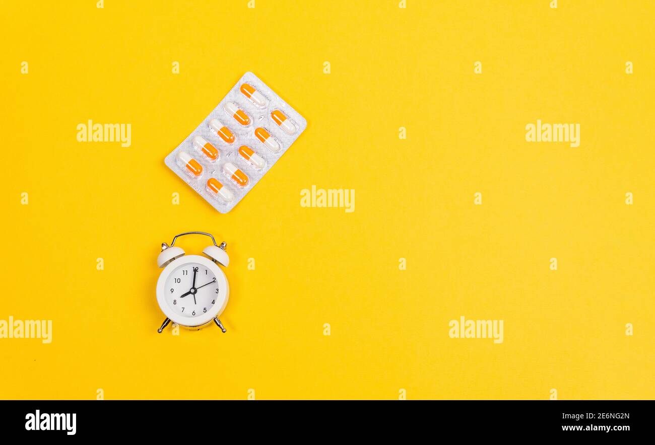 Contraception Day contraceptive pills blister with alarm clock on ...