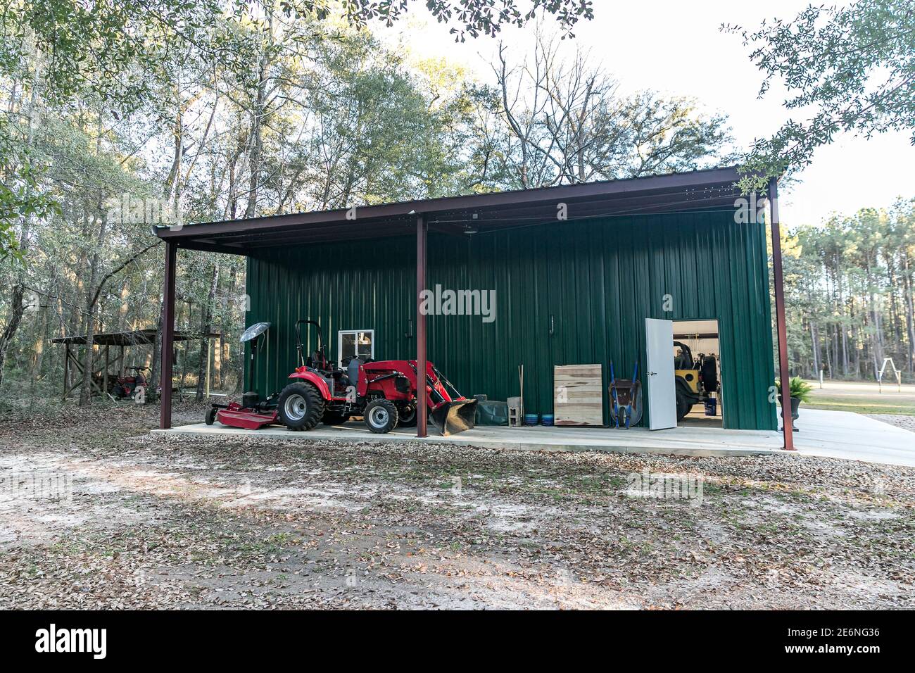 Large green outdoor metal building Stock Photo - Alamy