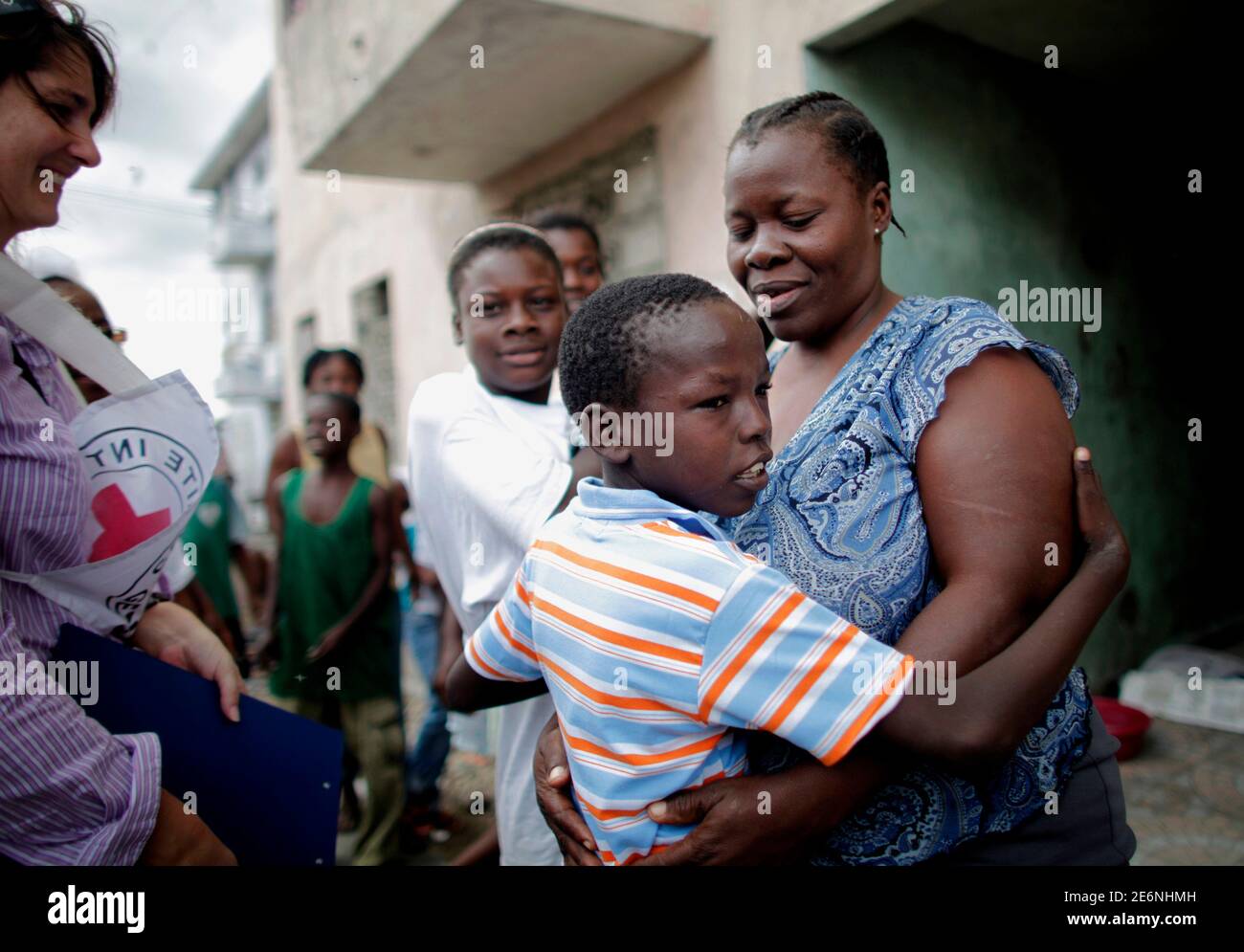Family reunited disaster hi-res stock photography and images - Alamy