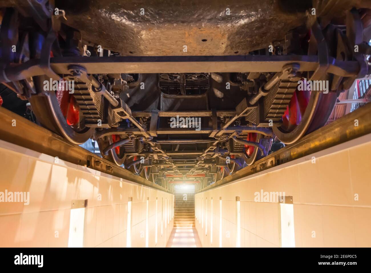 Wheels of an old locomotive train locomotive from below. View of the ...