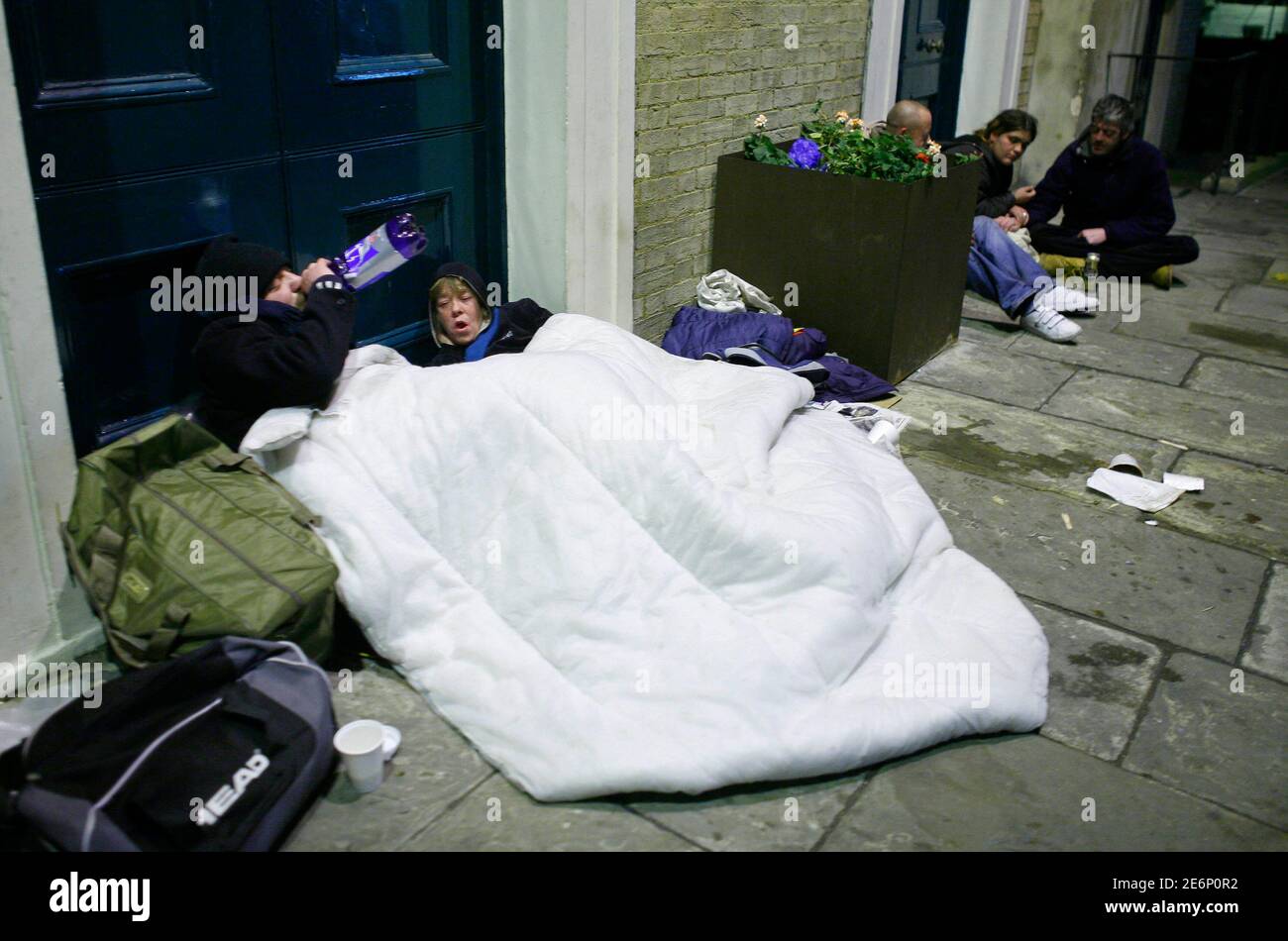 Homeless people sleeping in doorway hi-res stock photography and images ...