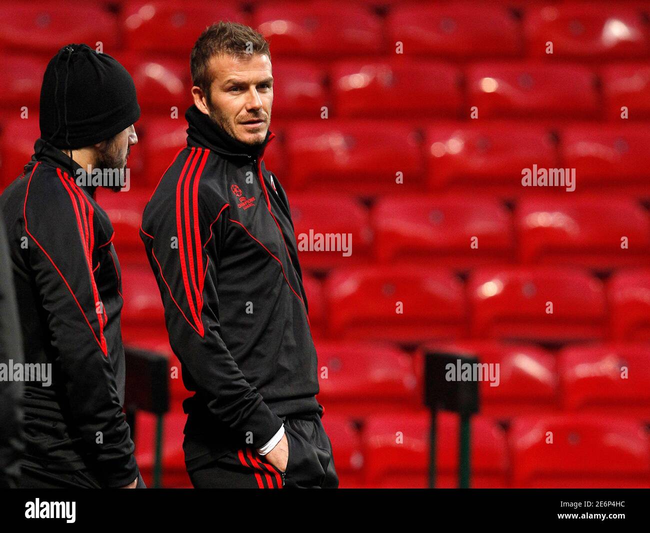 David beckham stands on old trafford pitch hi-res stock photography and ...