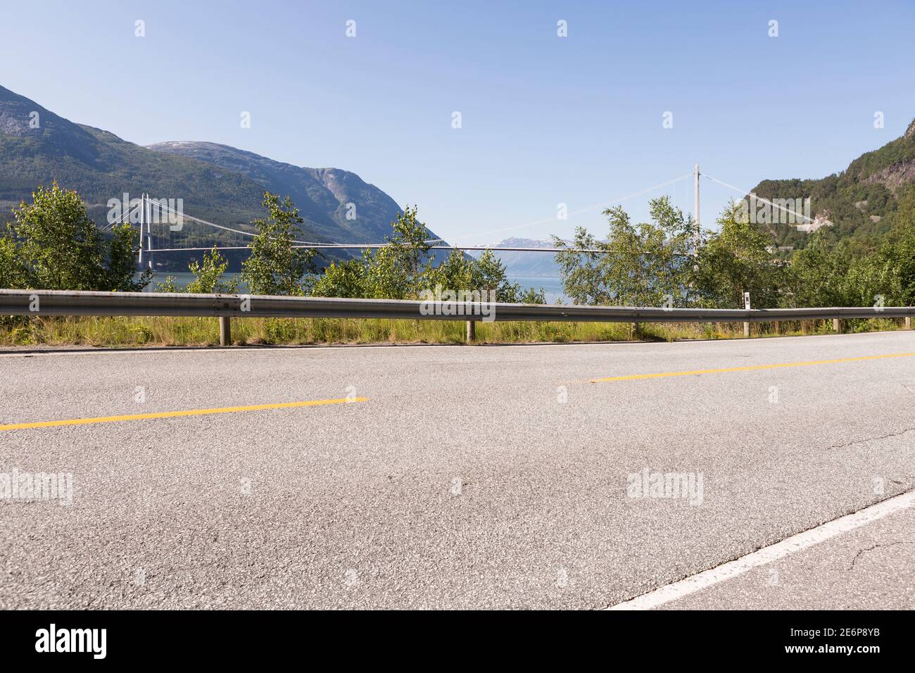 The great suspension bridge Hardangerbrua across the Eidfjorden in ...