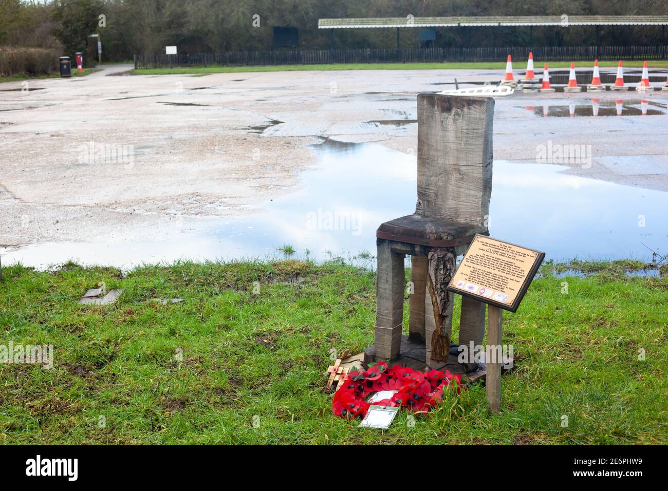 View of The Empty Chair Carved Memorial and Rememberance Day Poppies ...