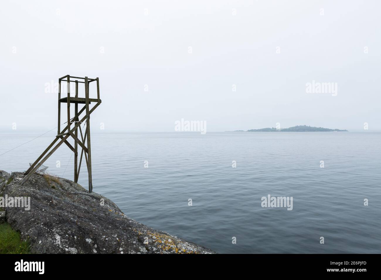 Wooden lookout at the coast of Jelsa at the Boknafjord with view to the ...