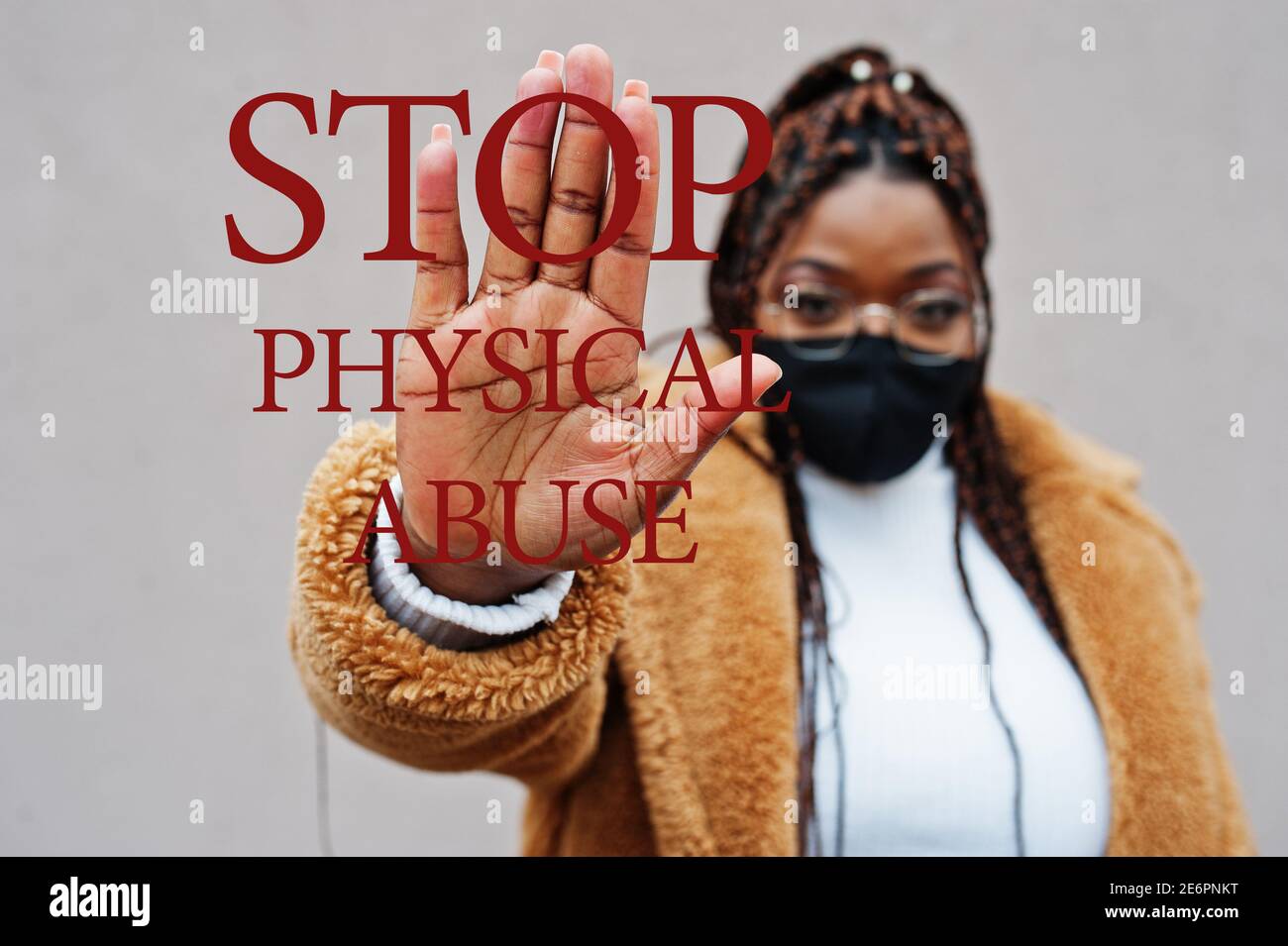 Stop physical abuse. African american woman, wear black face mask show ...