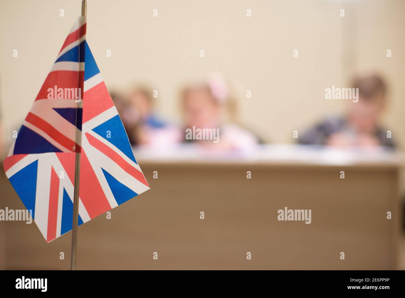 The UK flag is on the desk of the teacher classroom at the school Stock ...