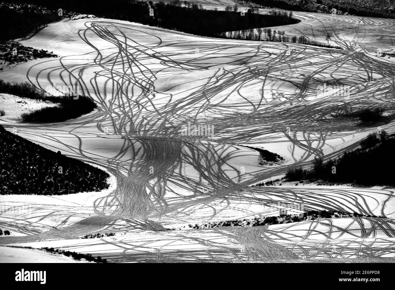 Snow path snowmobiles mountains tracks trails Stock Photo - Alamy