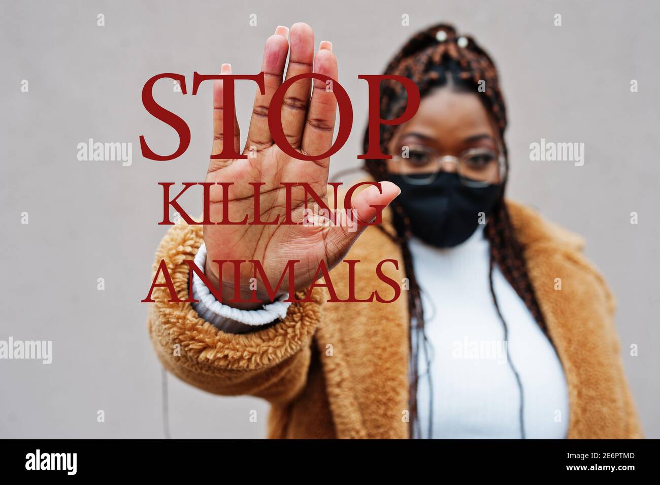 Stop killing animals. African american woman, wear black face mask show ...