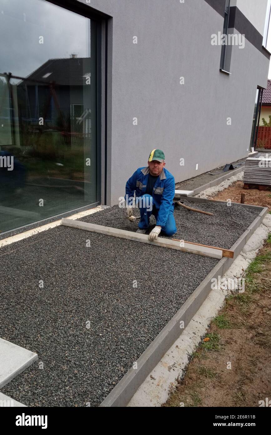 Paving works, preparation for work, paving near the house.2020 Stock ...