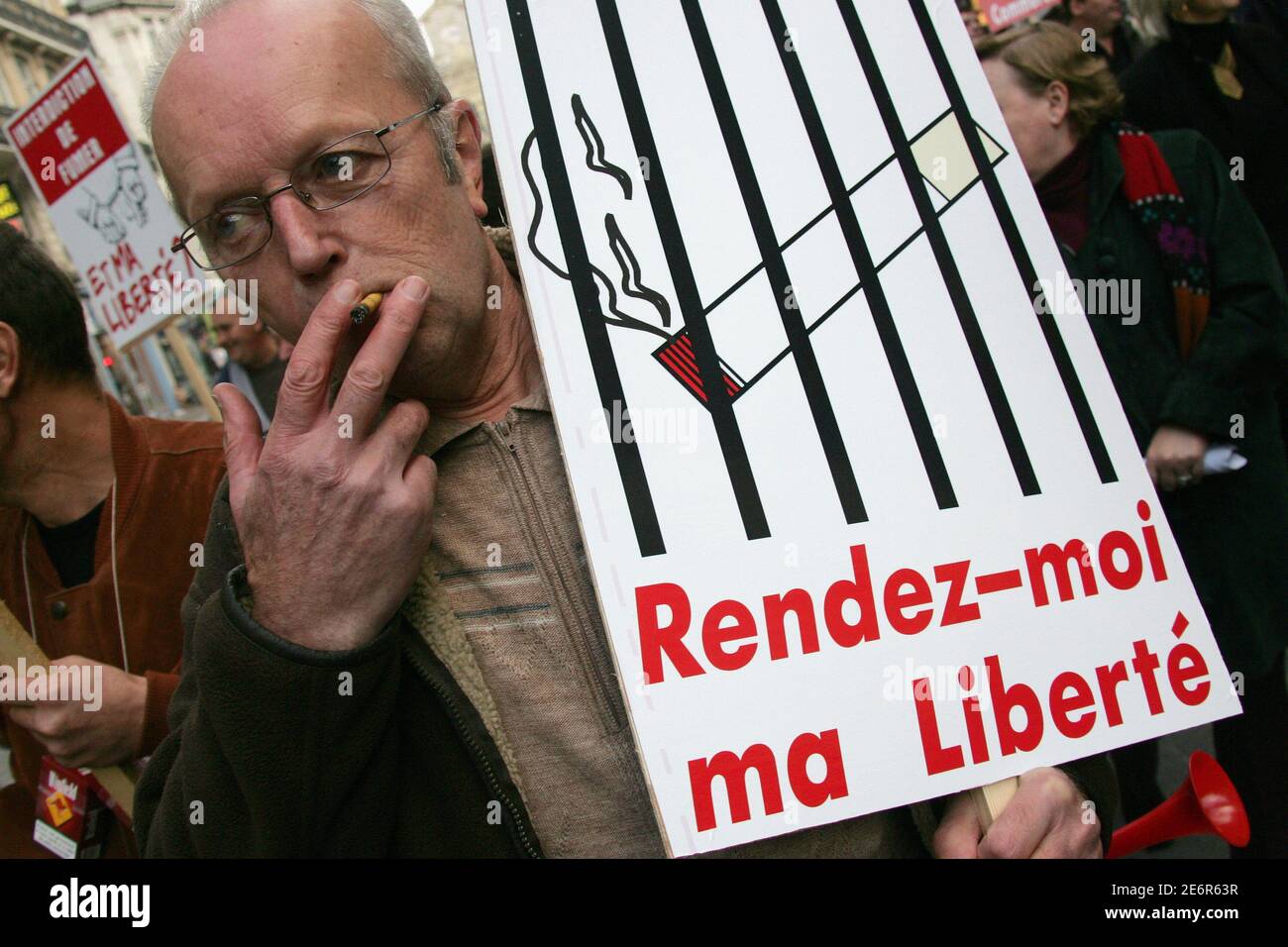 Man smoking cigarette france hi-res stock photography and images - Alamy