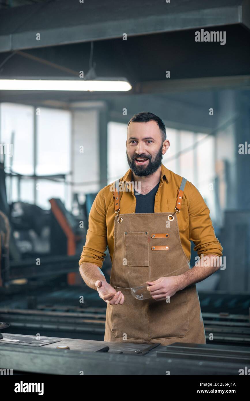 Metal industry worker at factory Stock Photo - Alamy