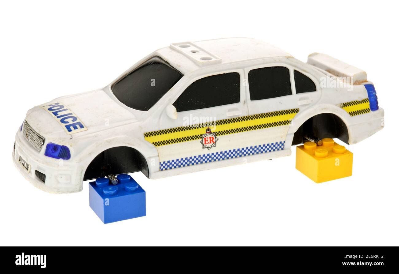 Toy Police Patrol car with no wheels on a white background Stock Photo ...