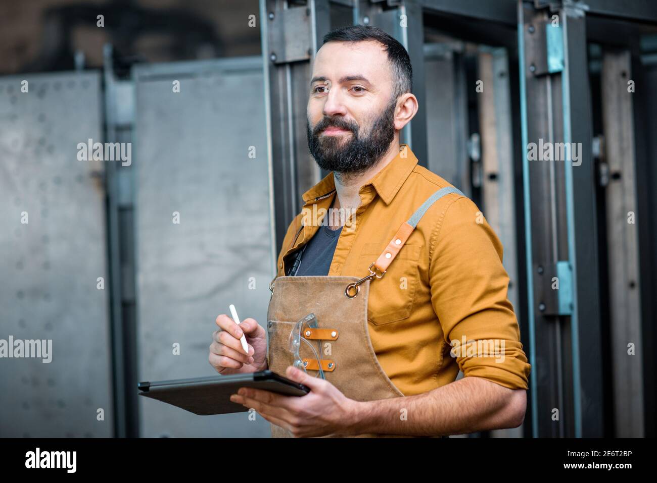 Worker with a digital tablet at the plant Stock Photo - Alamy