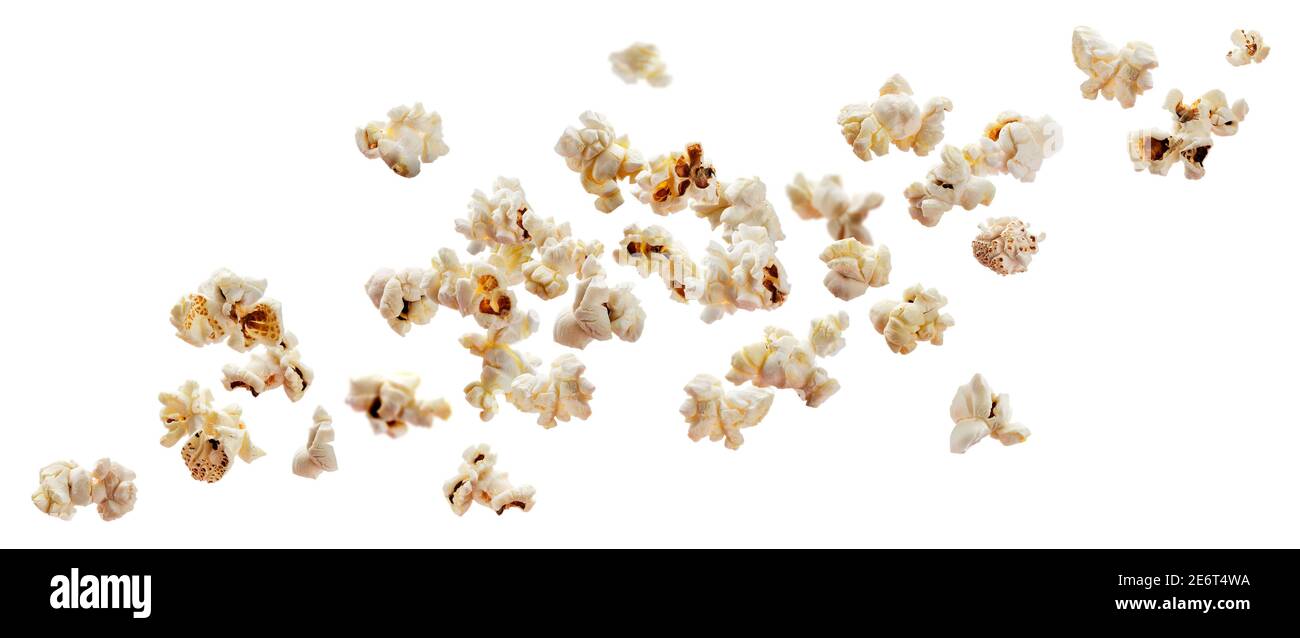Falling popcorn isolated on white background Stock Photo - Alamy